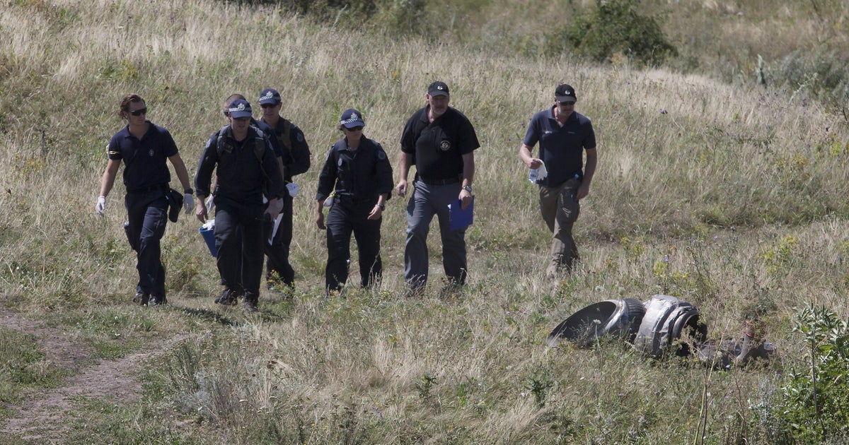 Malaysia Airlines Flight 17 crash investigation finally ramps up - CBS News