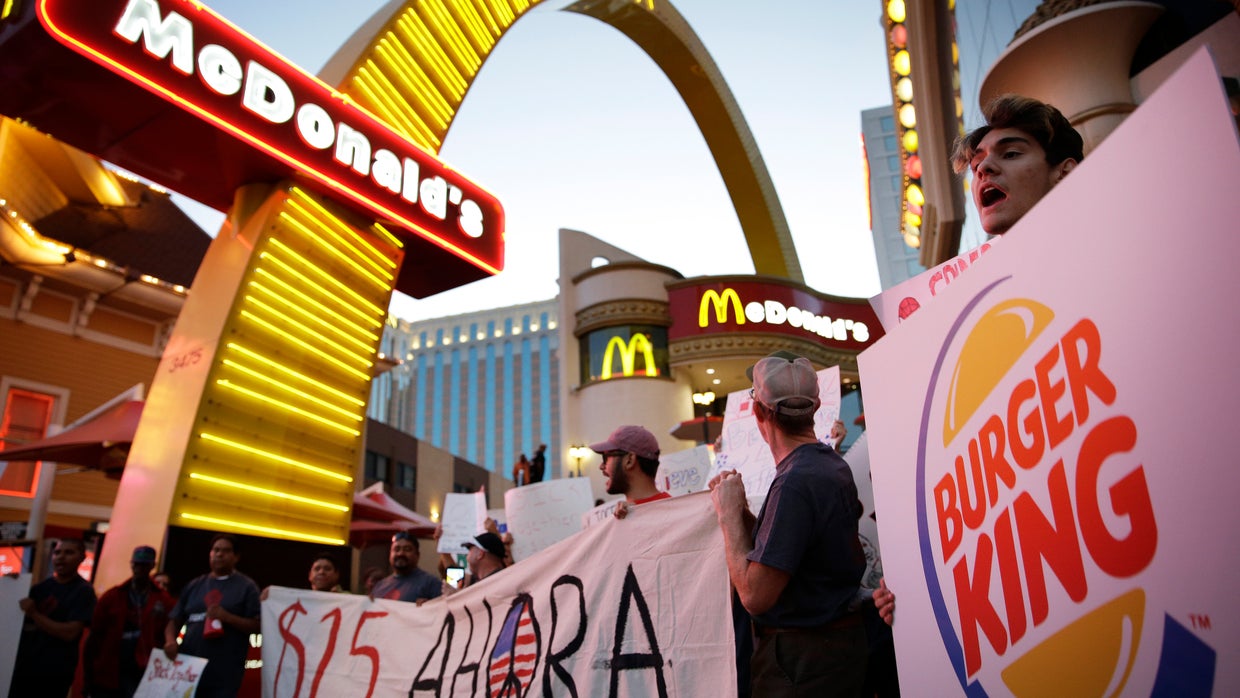 Fast-food workers strike across country, arrests made - CBS News