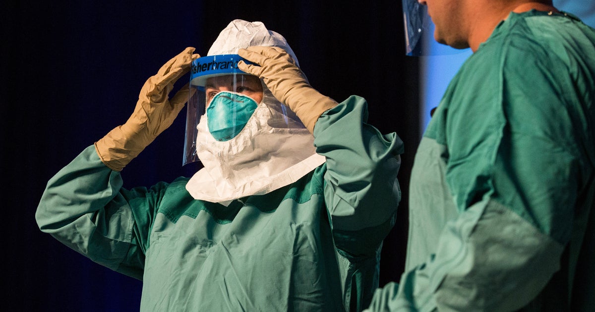 Nurses strike to protest Ebola preparedness - CBS News