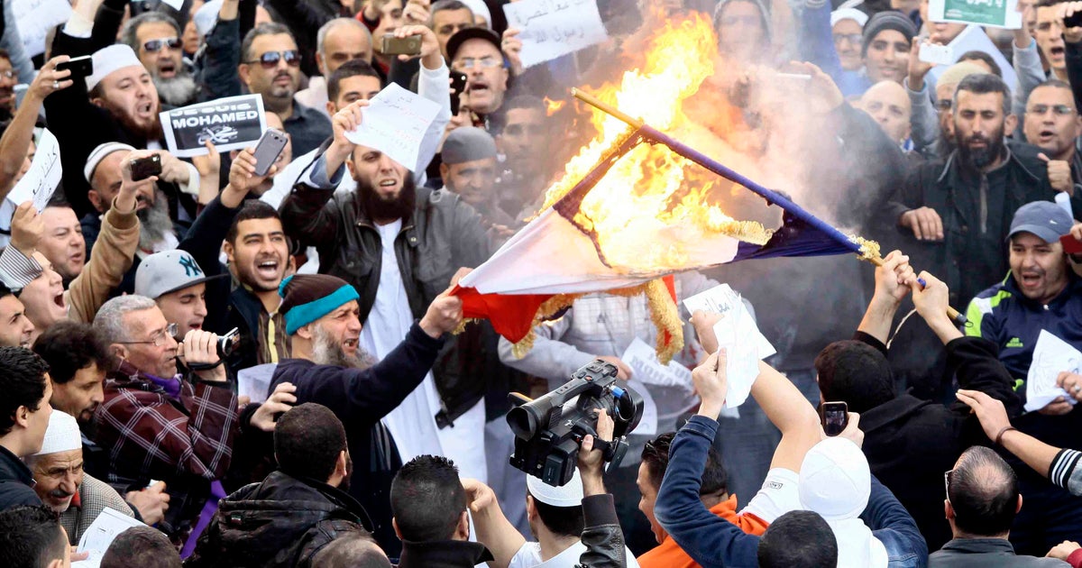 Muslims protest Charlie Hebdo prophet cartoon; 4 killed in Niger - CBS News