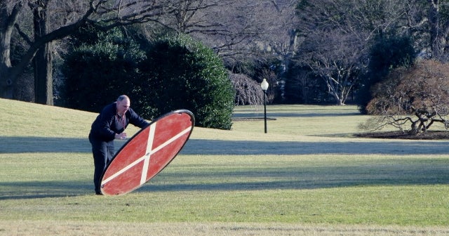 Why is there a big red coaster on the White House lawn? - CBS News