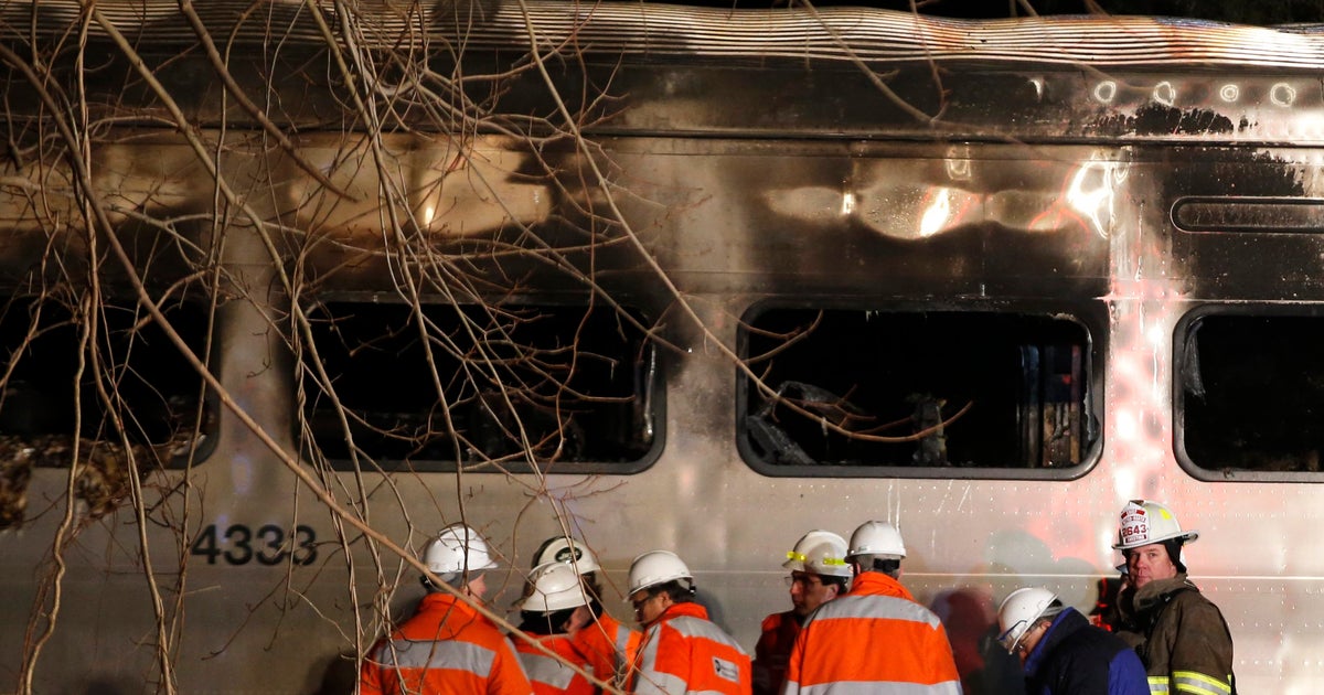 Commuter train slams into SUV in deadly crash near New York City - CBS News