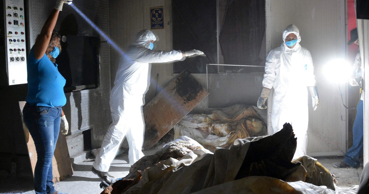 61 rotting bodies found at funeral home in Mexico - CBS News