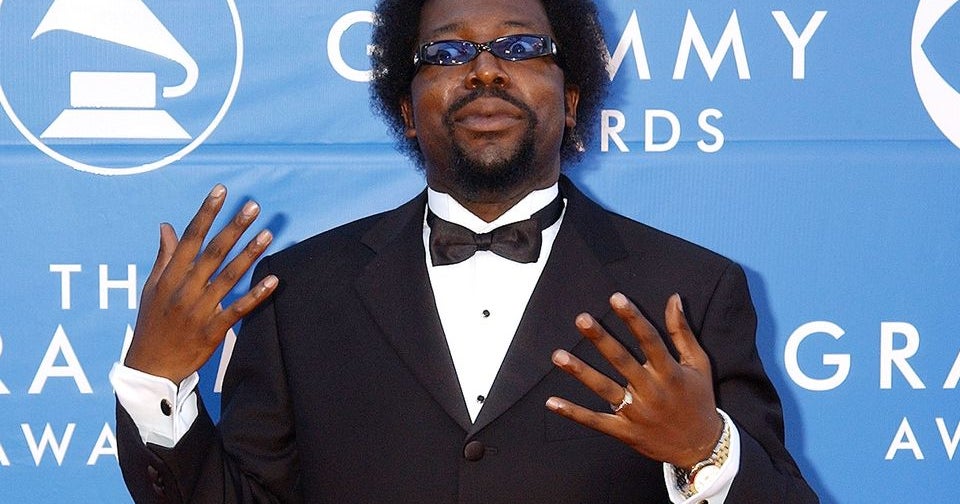 Rapper Afroman arrested for punching fan on stage - CBS News