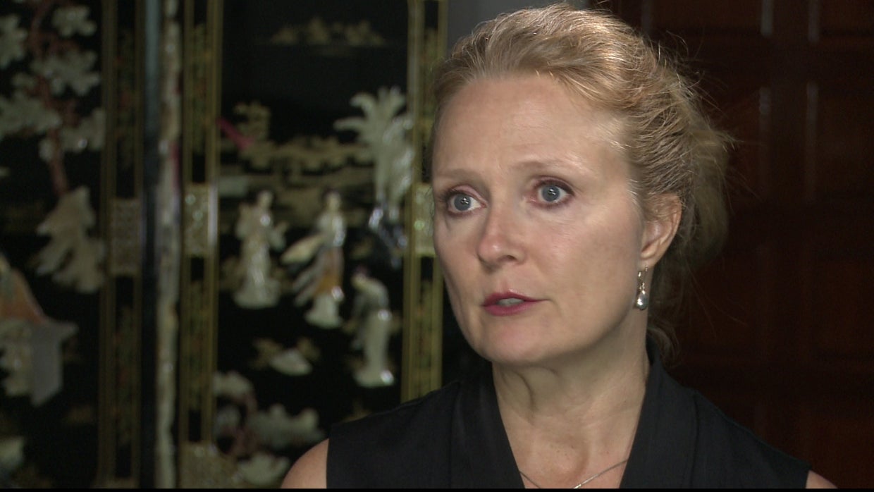 Families long for answers one year after MH370 vanishes - CBS News