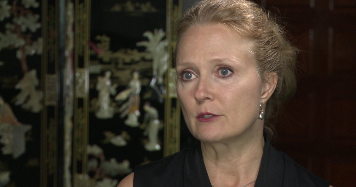 Families long for answers one year after MH370 vanishes - CBS News