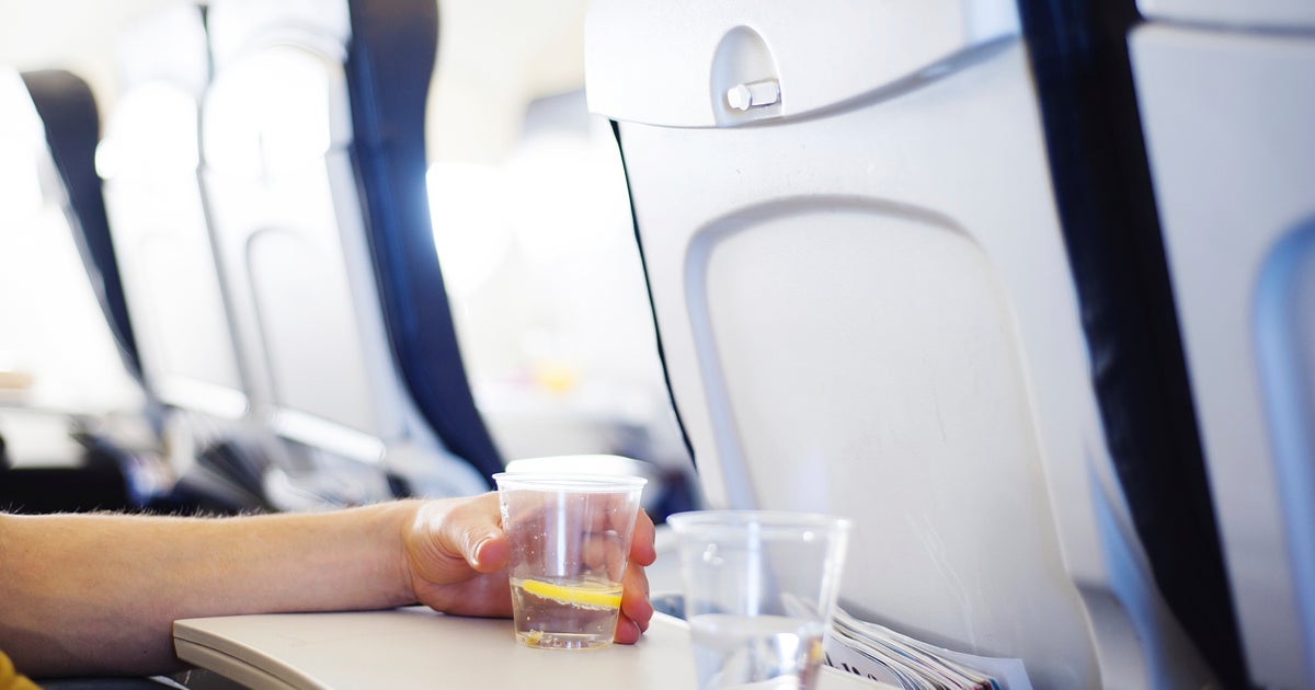 How risky are air travel germs? - CBS News
