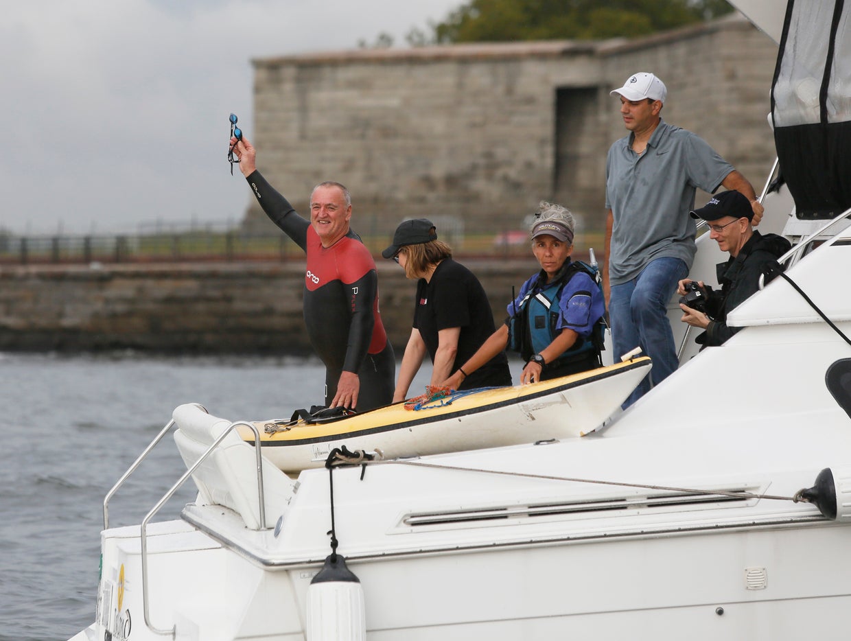 Legendary long-distance swimmer aims to circle the globe - CBS News