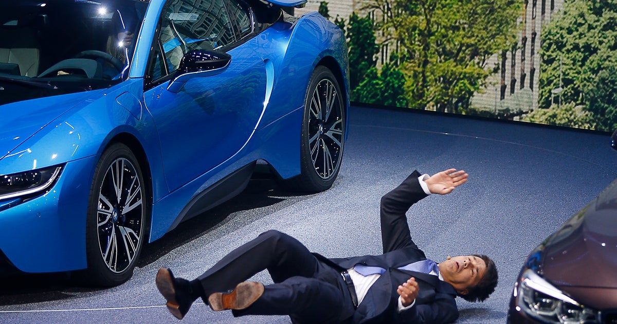 BMW CEO collapses during presentation at auto show - CBS News