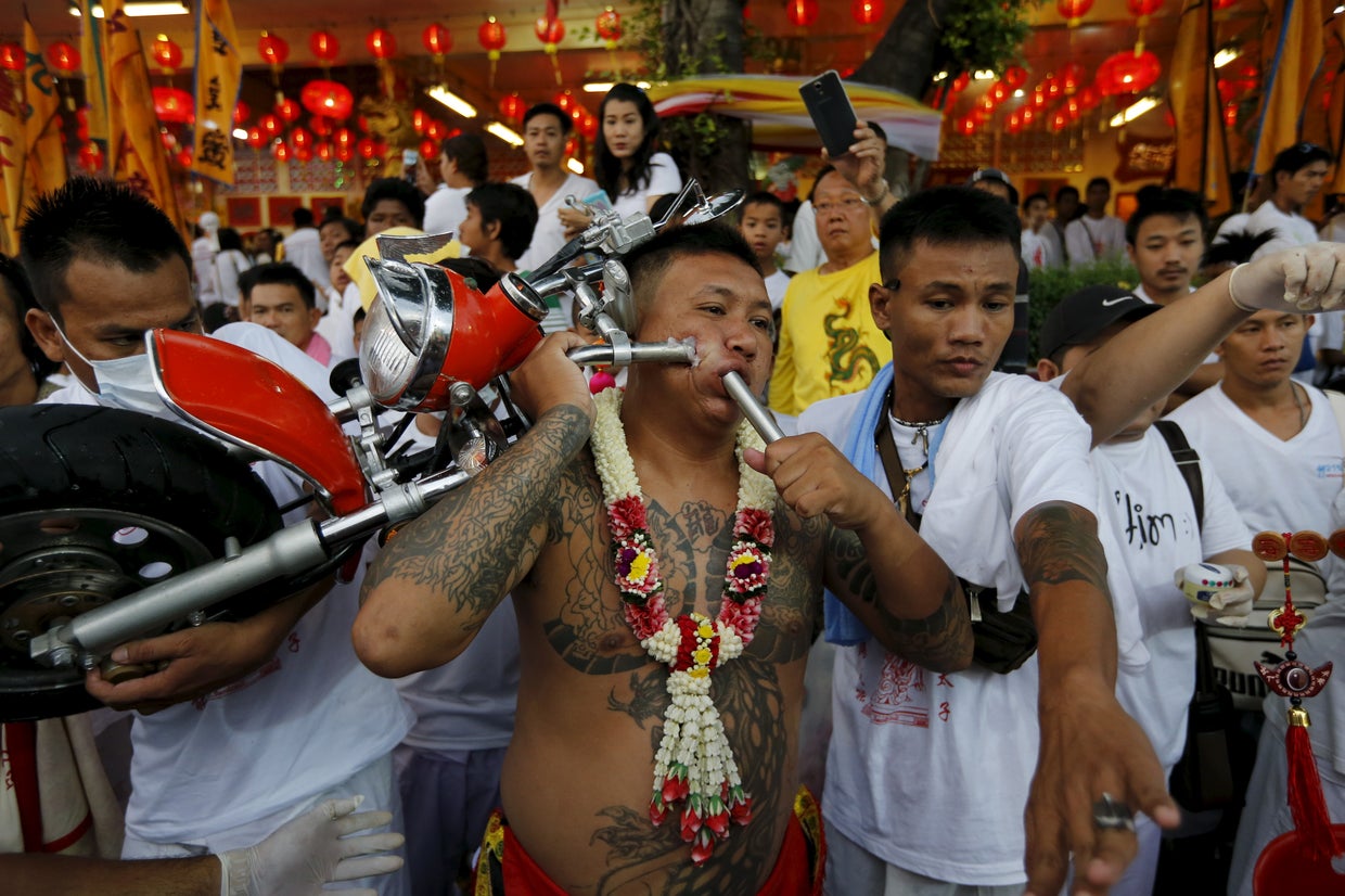 Bizarre piercings at Phuket Vegetarian Festival