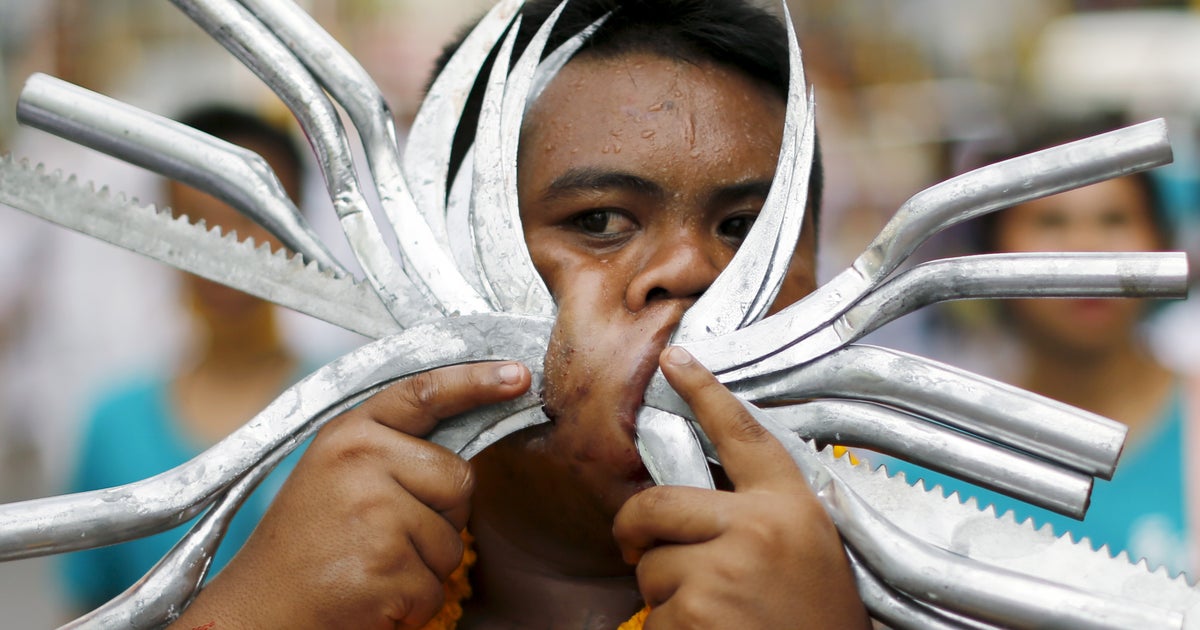Bizarre piercings at Phuket Vegetarian Festival