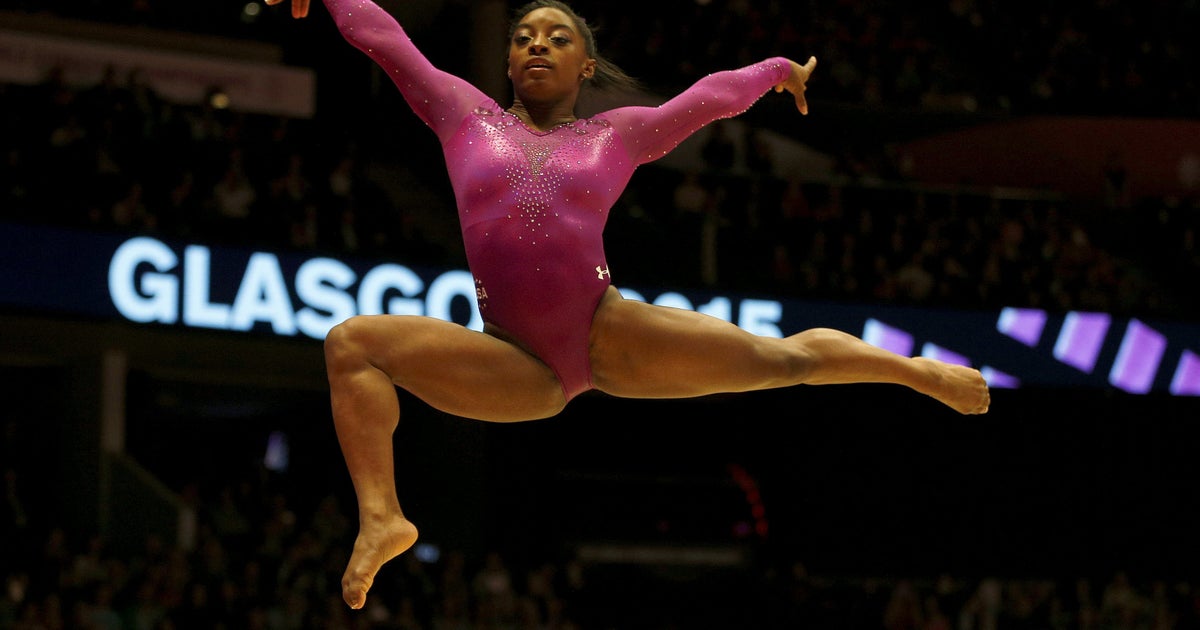 U.S. gymnast earns record world championship gold medals - CBS News