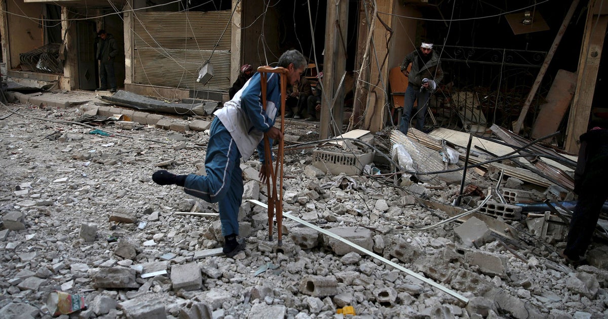 Syrian rebels lob mortar shells into capital Damascus - CBS News