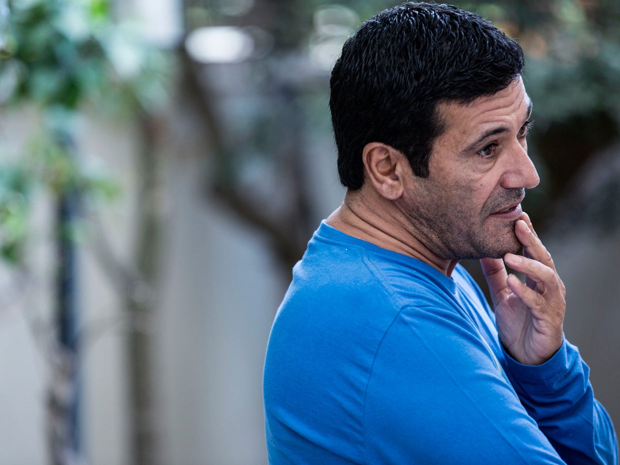 Man explains how China helped his $2 billion con game - CBS News