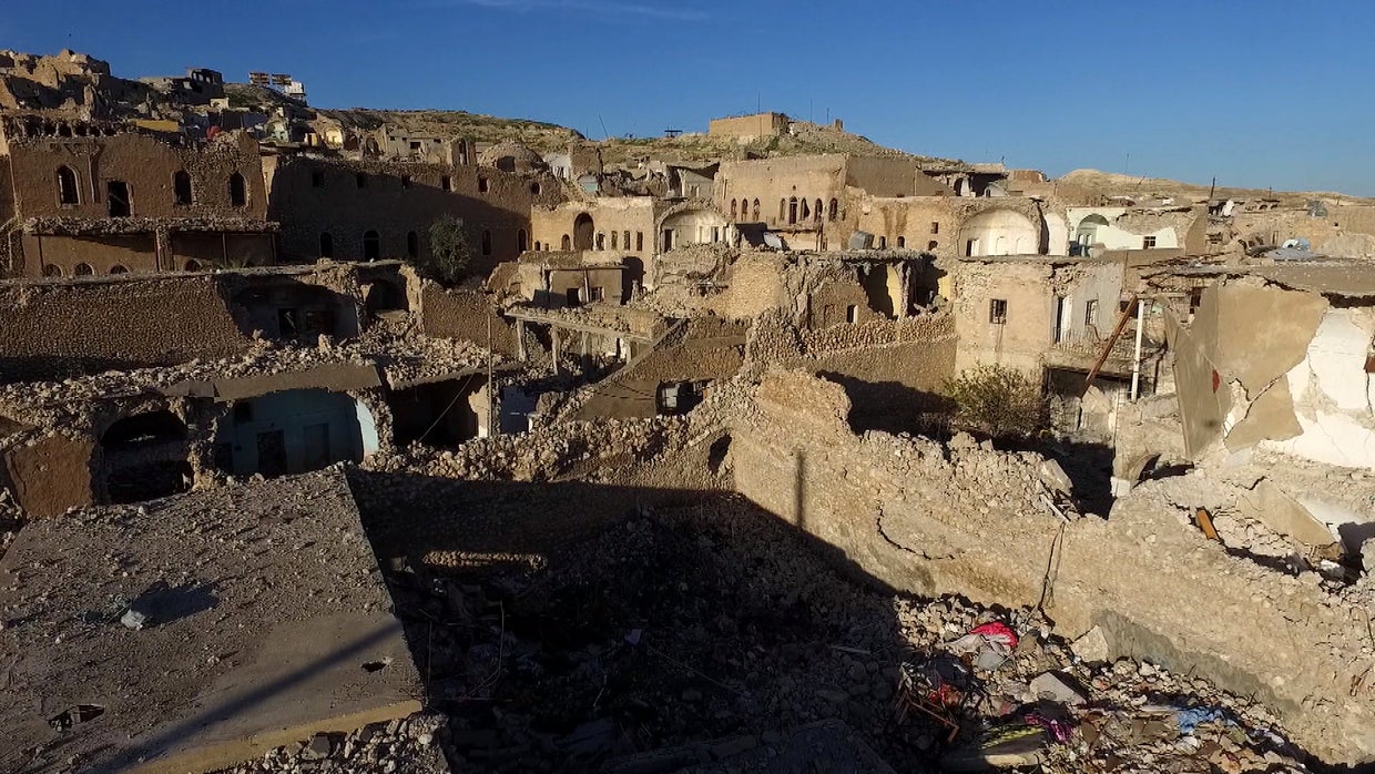 Why did ISIS attack the Yezidi people? - CBS News