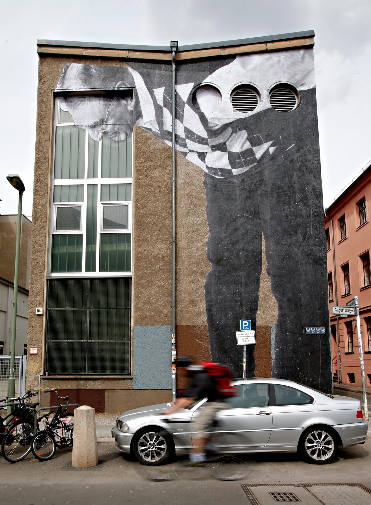 French street artist JR makes the Louvre Pyramid disappear
