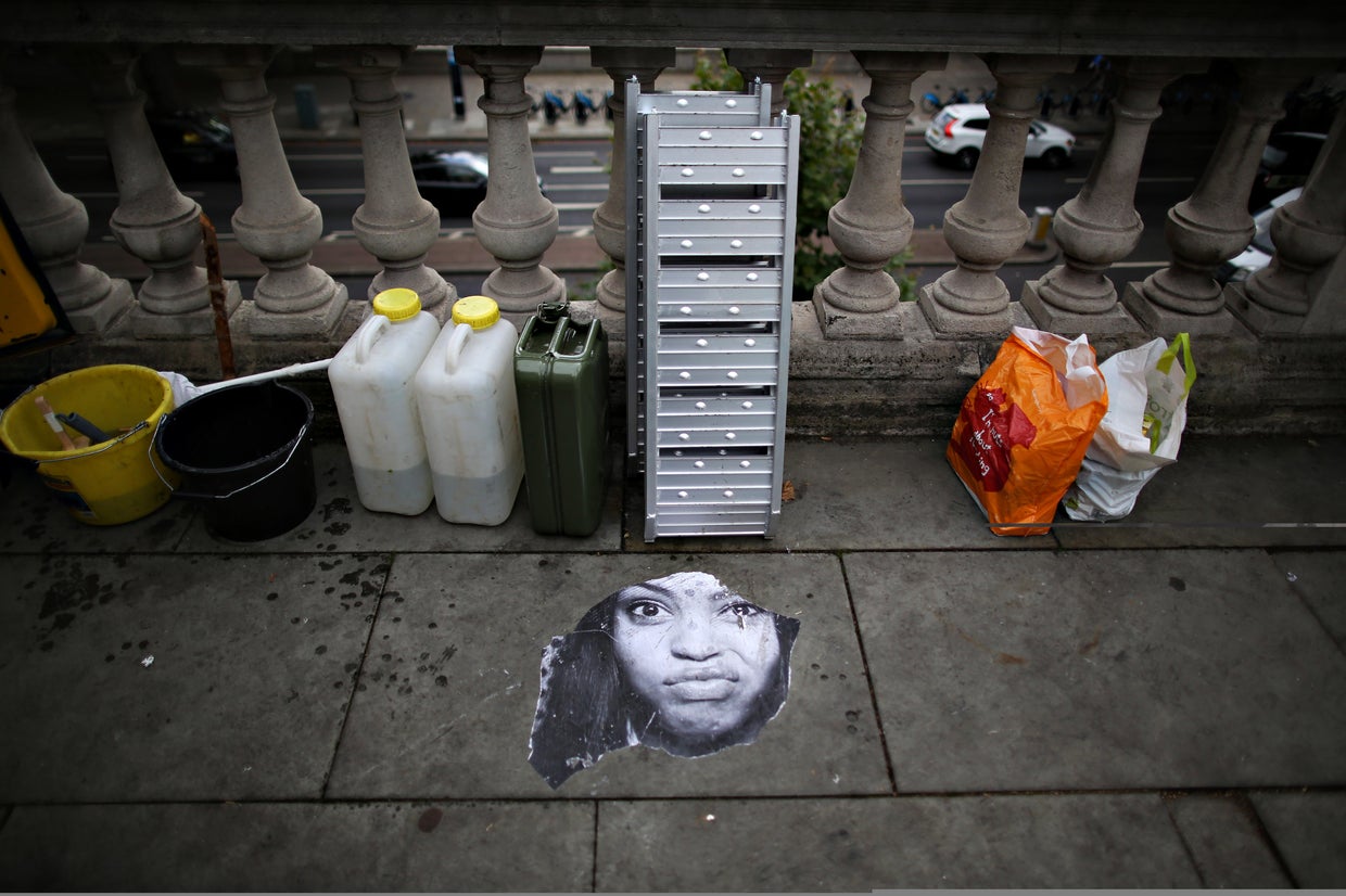 French street artist JR makes the Louvre Pyramid disappear