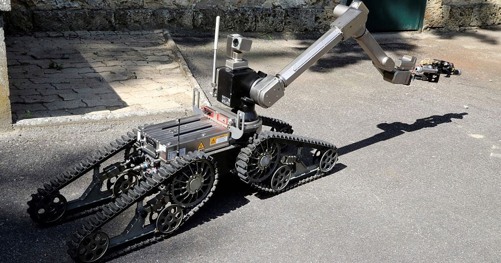 From dealing death to herding cattle, robots report for duty - CBS News