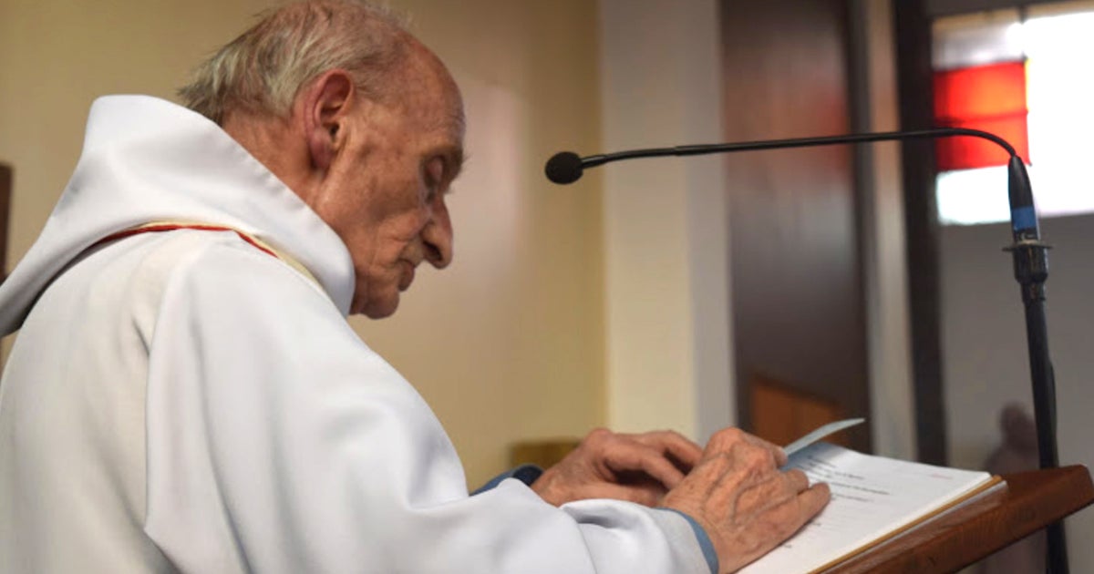 2 attackers slay priest in France church - CBS News