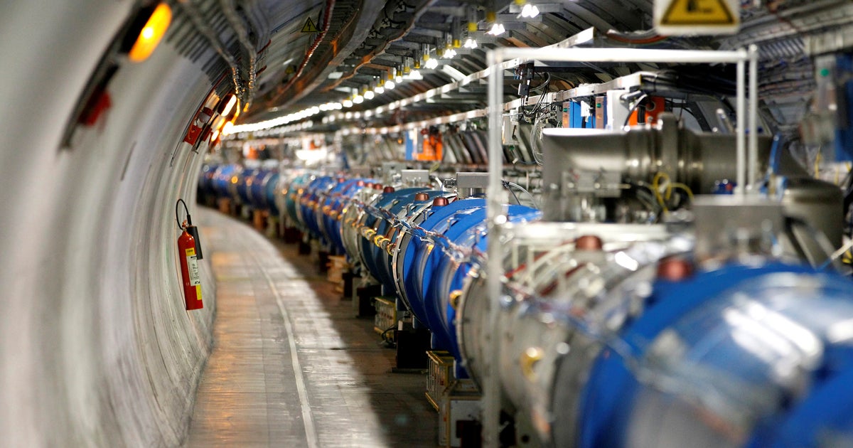 Physicists find never-before-seen subatomic particle - CBS News