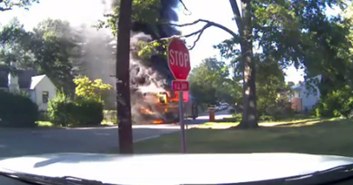 School bus goes up in flames with 20 kids on board - CBS News