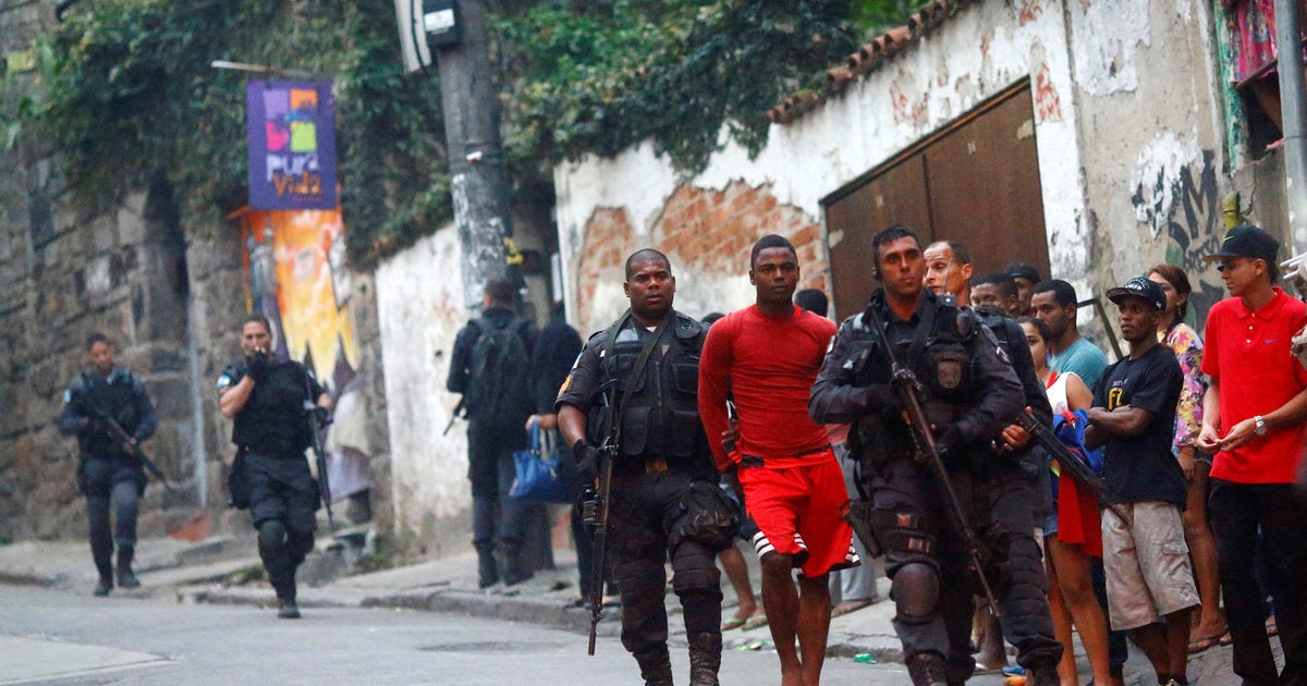 Rio shootout with police kills 3 - CBS News
