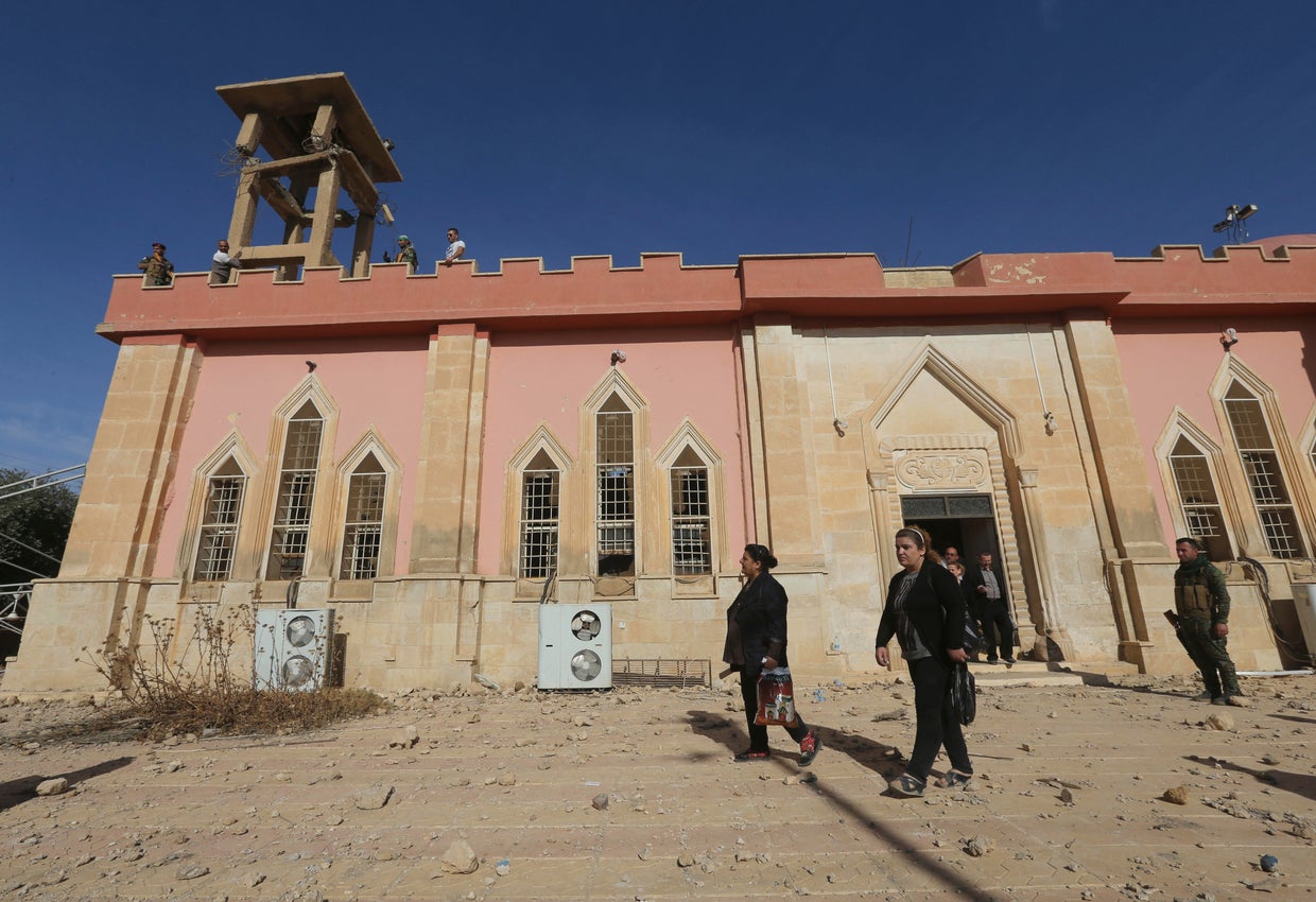 Gasps, tears as group of Iraqi Christians return to ISIS-destroyed ...