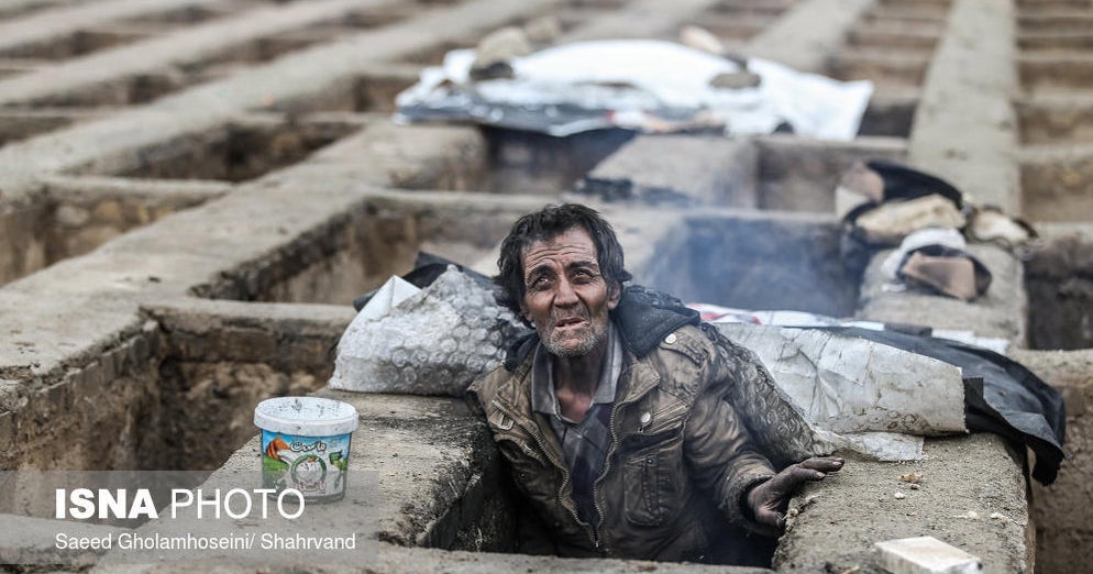 Pictures of homeless sleeping in empty graves shock Iran - CBS News