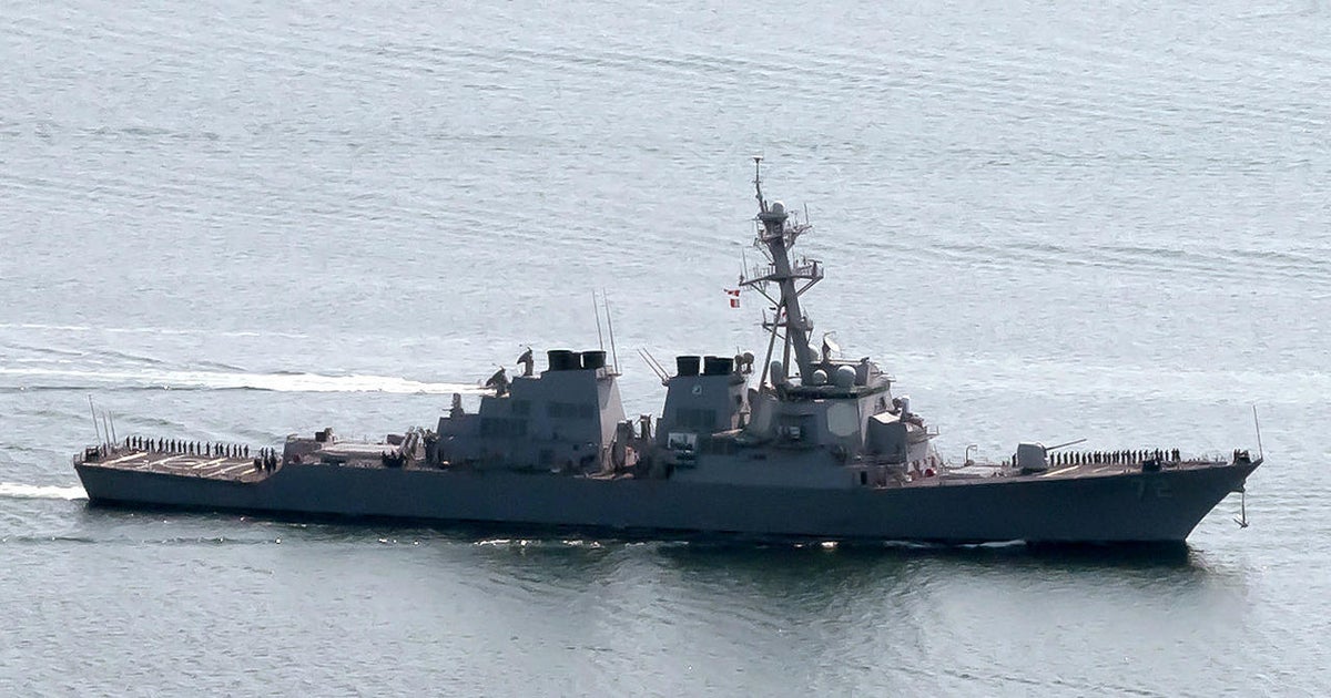 US Navy destroyer fires warning shots at Iran patrol boats in Strait of ...