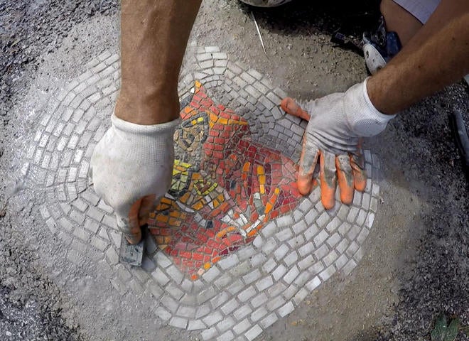 Street art: Jim Bachor's pothole mosaics