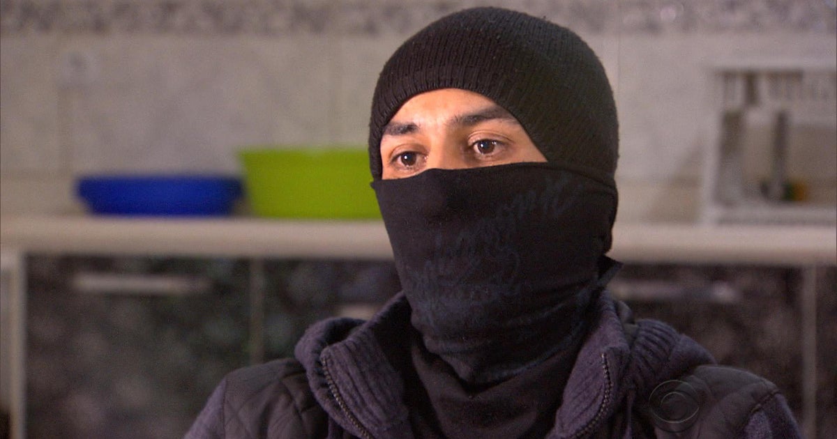 ISIS kills "anyone who argues with them," says defector - CBS News