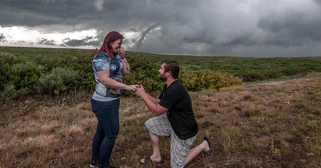 Proposal photo taken during tornado chase goes viral - CBS News
