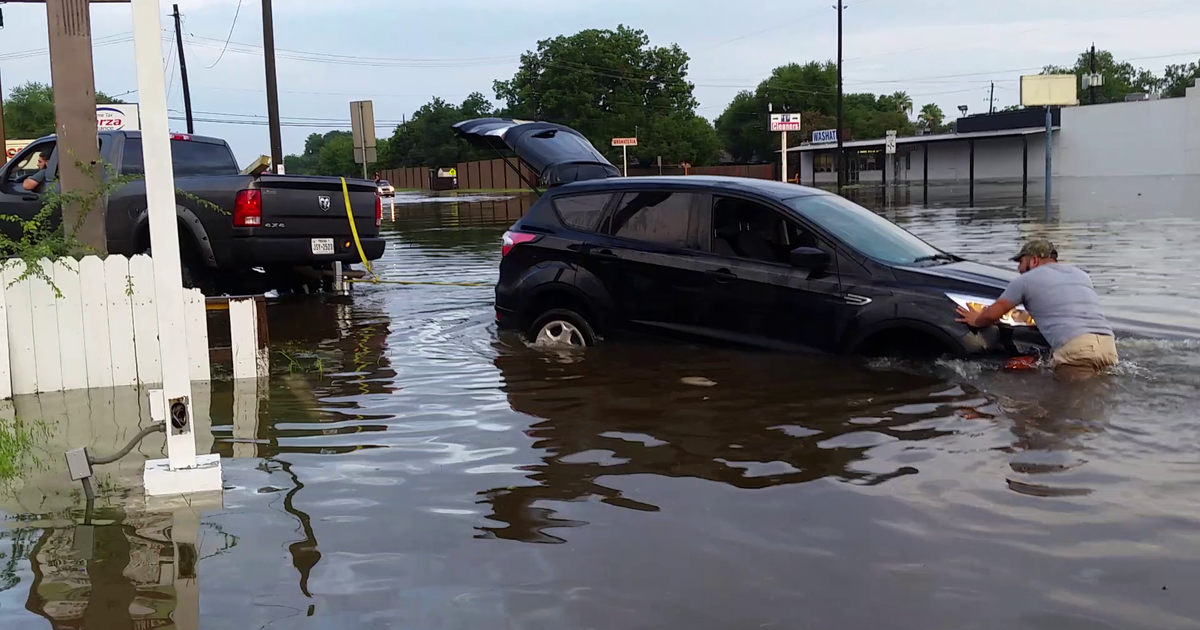 Heavy rains wallop Houston area, causing widespread flooding - CBS News