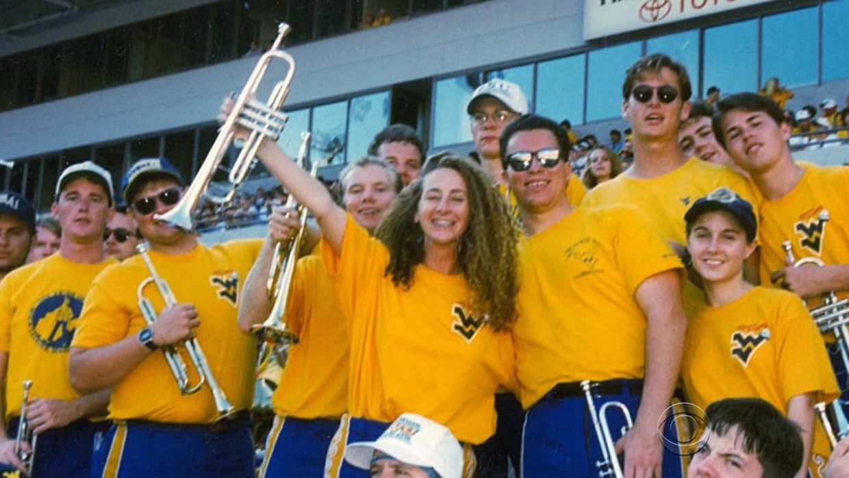 Still giving marching band the college try, 35 years later - CBS News