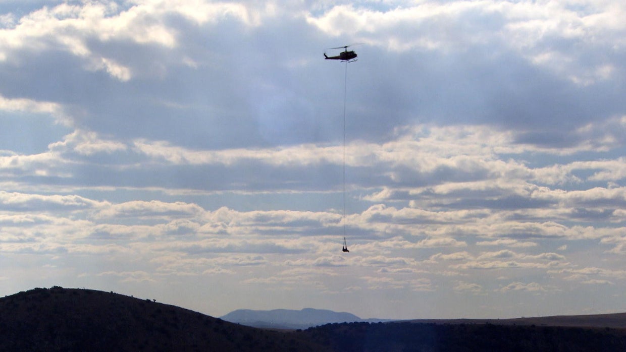 Saving rhino with helicopters - CBS News