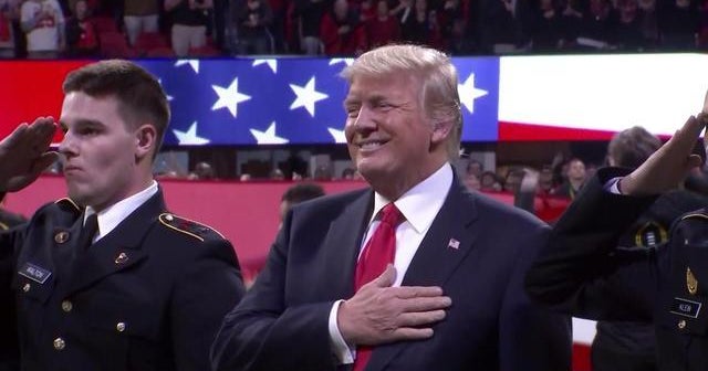 Watch Trump sing along with national anthem - CBS News