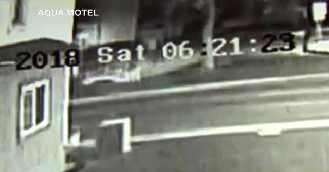 Car flies through the air, into building - CBS News