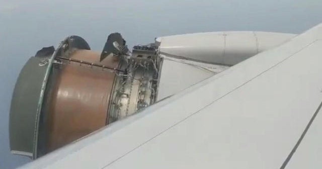 United Airlines jet apparently loses engine covering midflight - CBS News