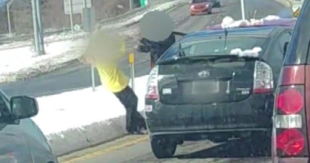 Drivers caught on video facing off in apparent case of road rage - CBS News