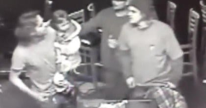 Video shows man holding girl, 4, amid violent bar fight - CBS News