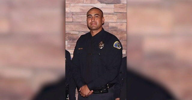Standoff suspect charged in murder of California police officer - CBS News