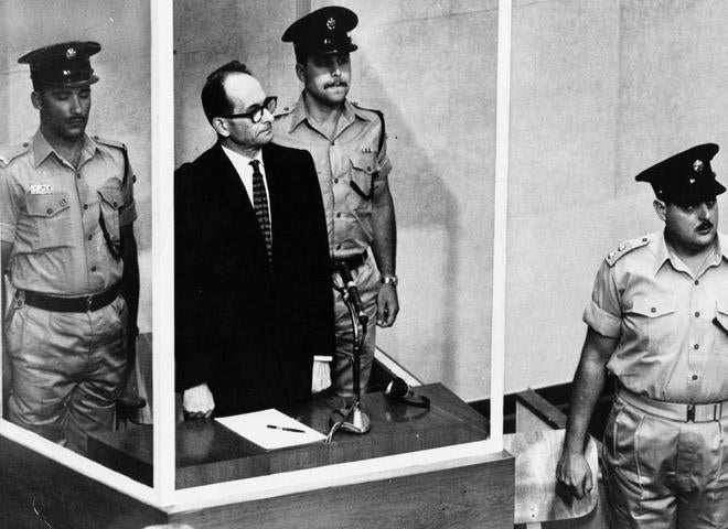 The man in the glass booth - CBS News