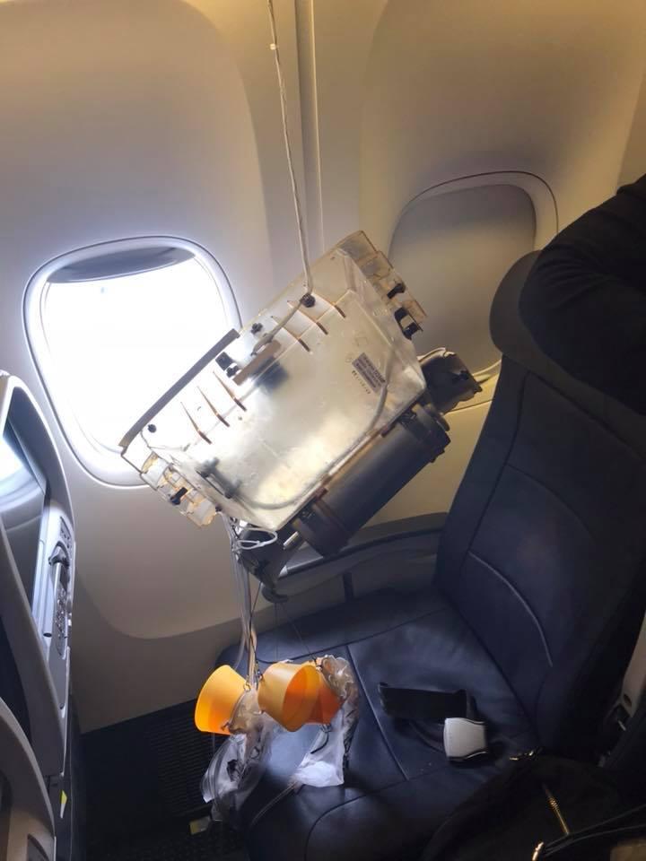 Toddler hit by oxygen canister on American Airlines flight - CBS News
