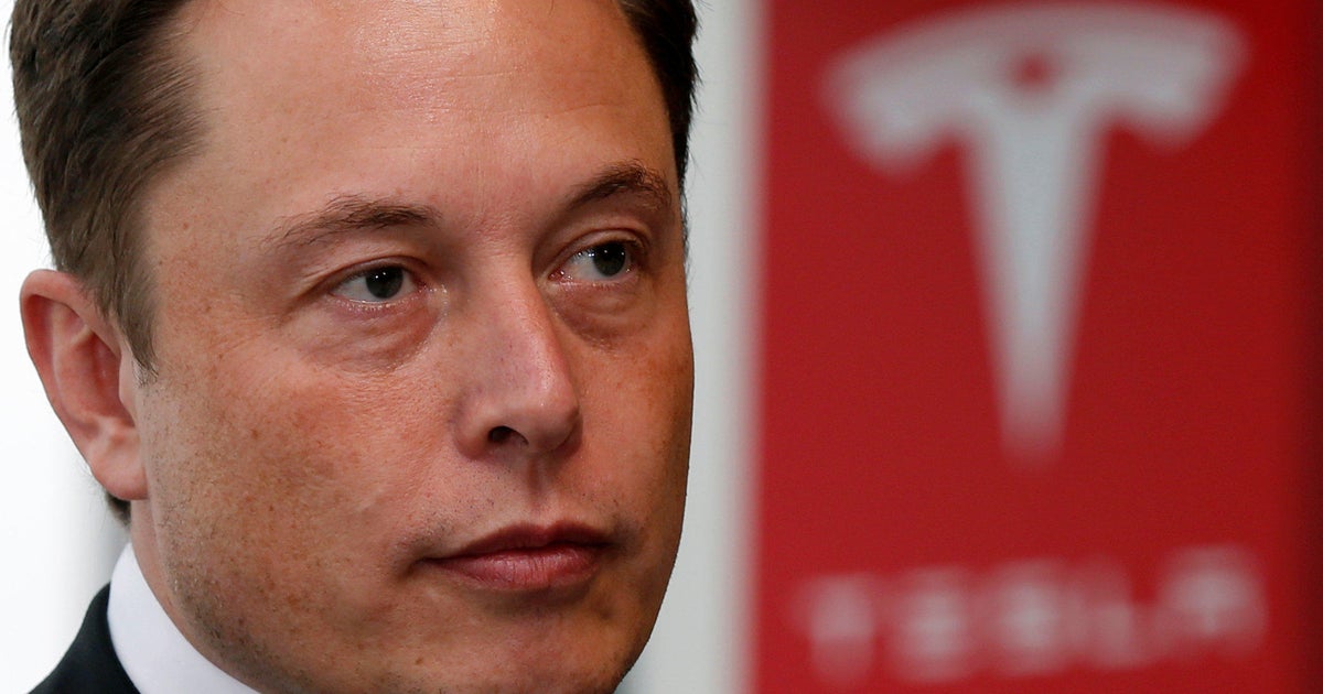 Elon Musk, Tesla's CEO, describes "excruciating year" - CBS News