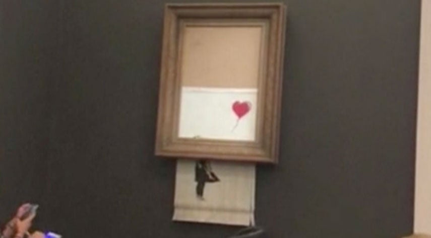 Banksy Art Self-Destructs Through Shredder Moment After $1.4 Million ...