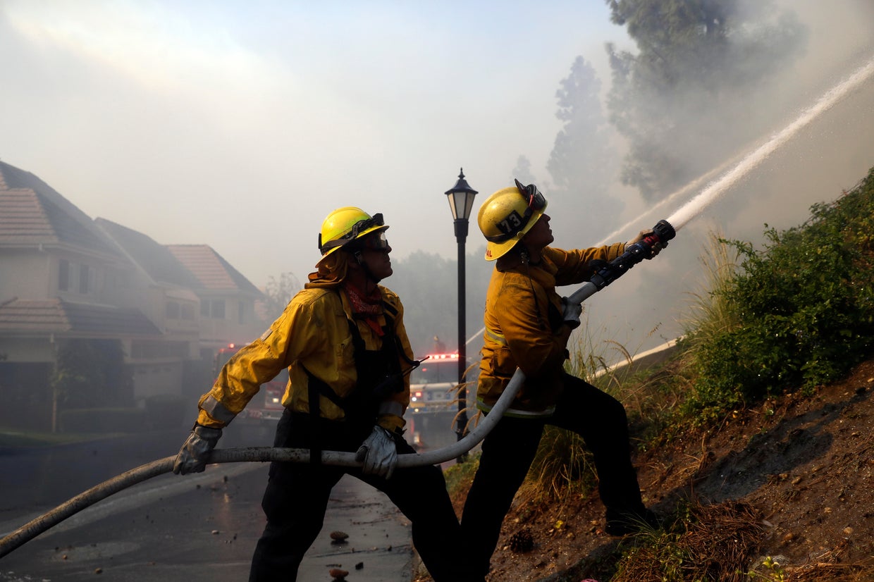 Wildfires tear through Northern, Southern California: Images of Camp ...