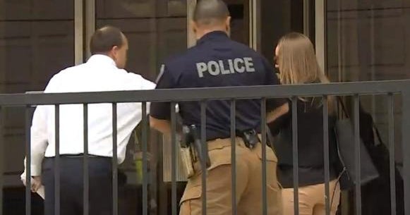 Police raid "secret archives" of Houston archdiocese in sex abuse probe - CBS News