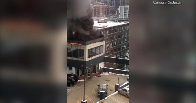 Chicago high-rise garage fire kills 1, injures 4 - CBS News