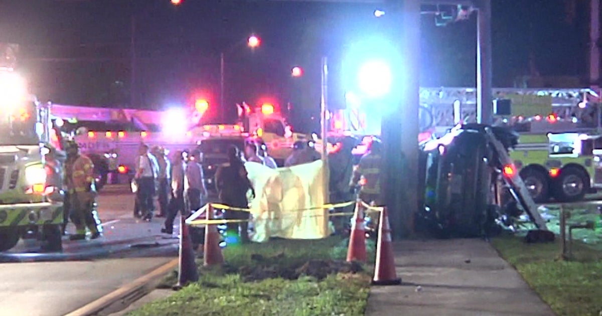 Two People Extricated From Vehicle Following Rollover Crash - CBS Miami