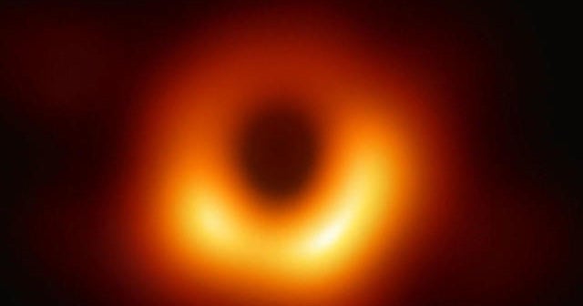 Astronomers capture black hole and its shadow for first time - CBS News